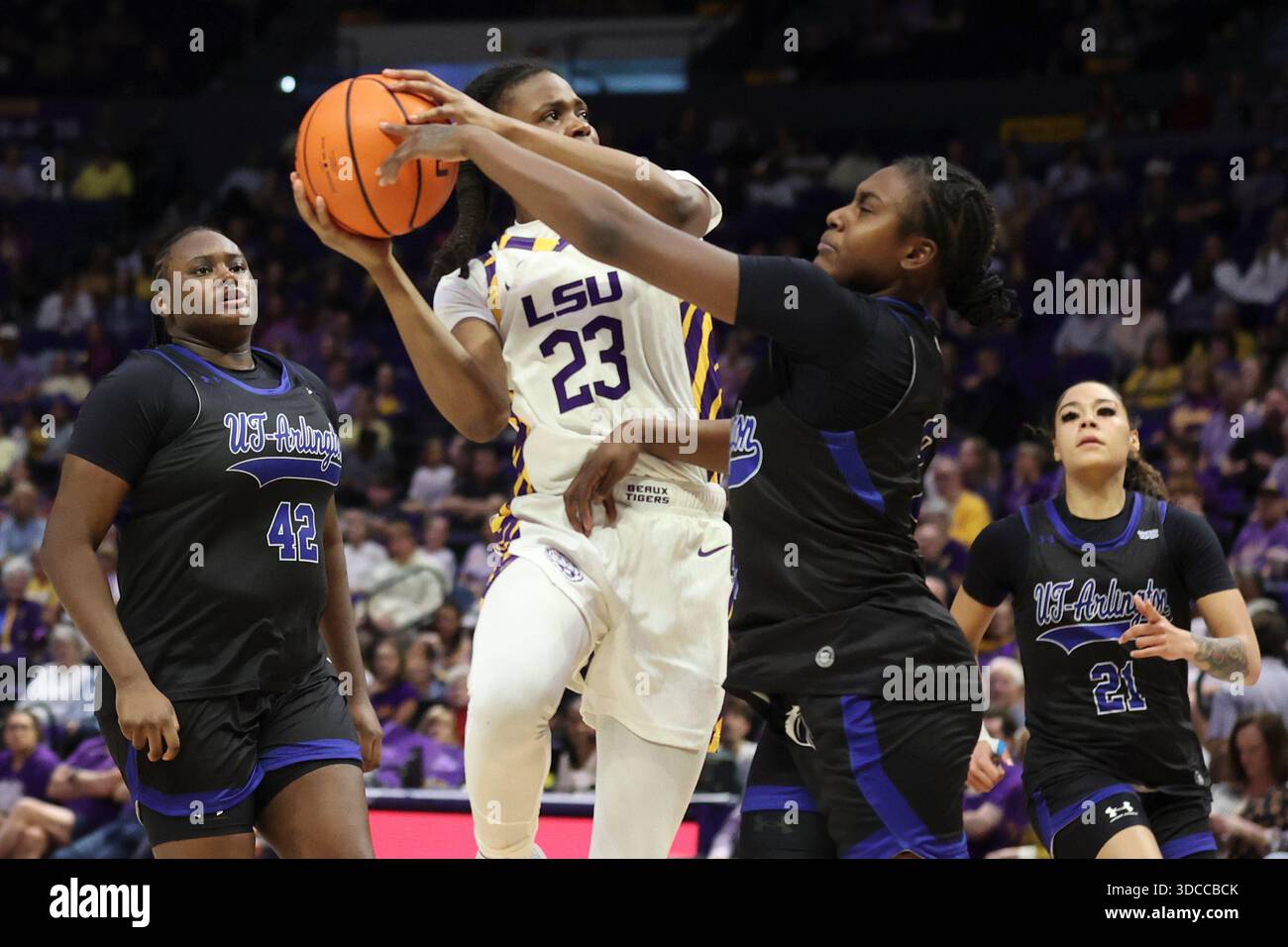Texas-Arlington guard Erin Sellers, center right, tries to strip the ...