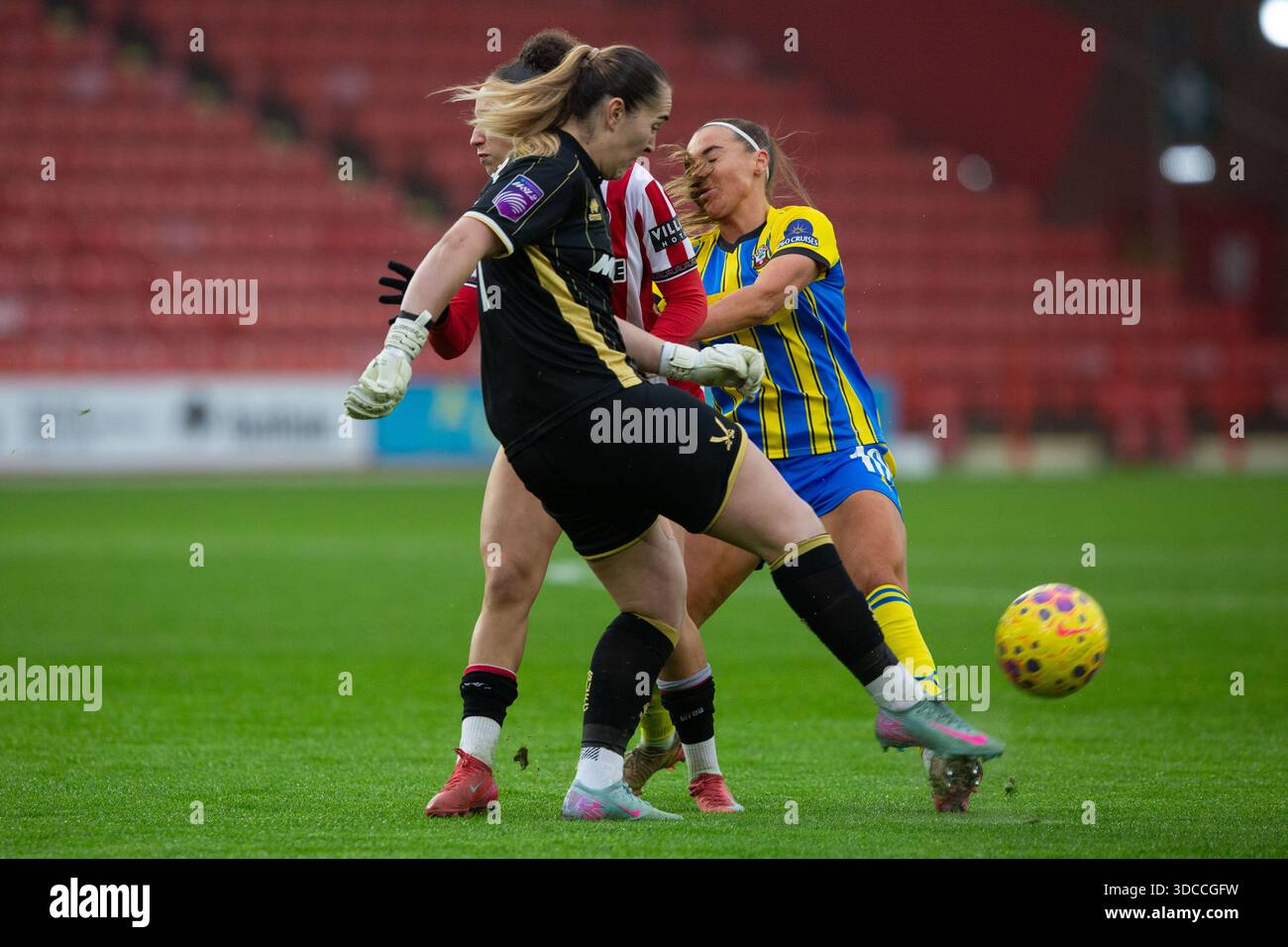 Sian Rogers (1 Sheffield United) clears the ball long up the field ...