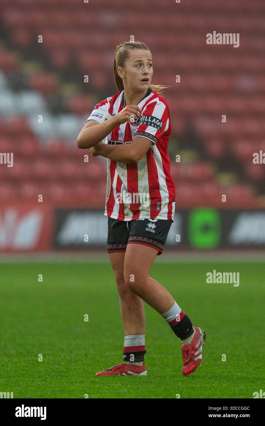 Full shot of Mollie Rouse (25 Sheffield United) as she puts on the ...