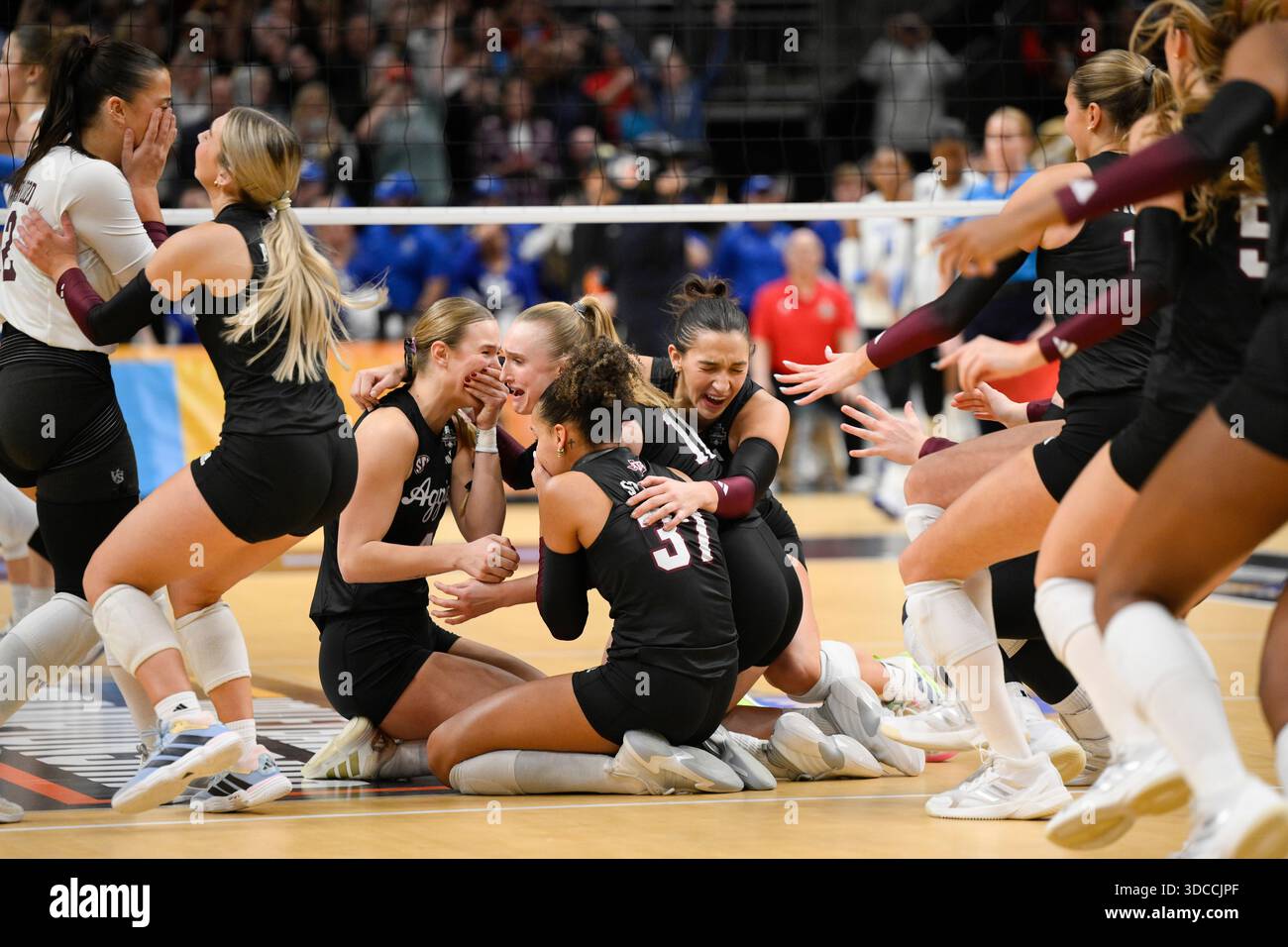 Texas A&M players celebrate after defeating Kentucky for the NCAA ...
