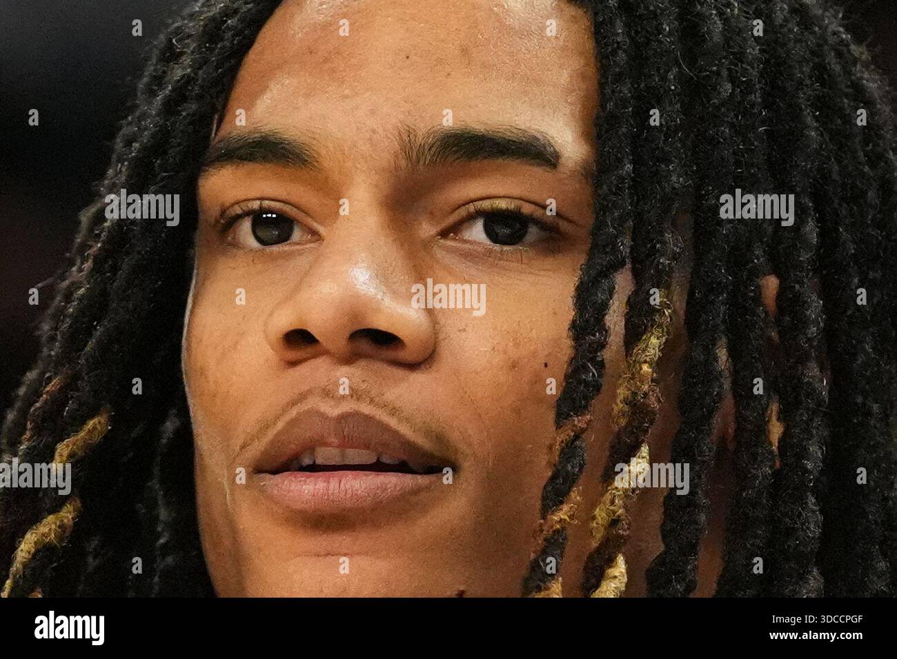 UConn guard Solo Ball watches teammates during the second half of an ...