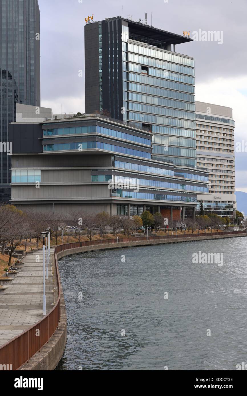 Majestic Osaka Castle towers over the serene expanse of Osaka Castle ...