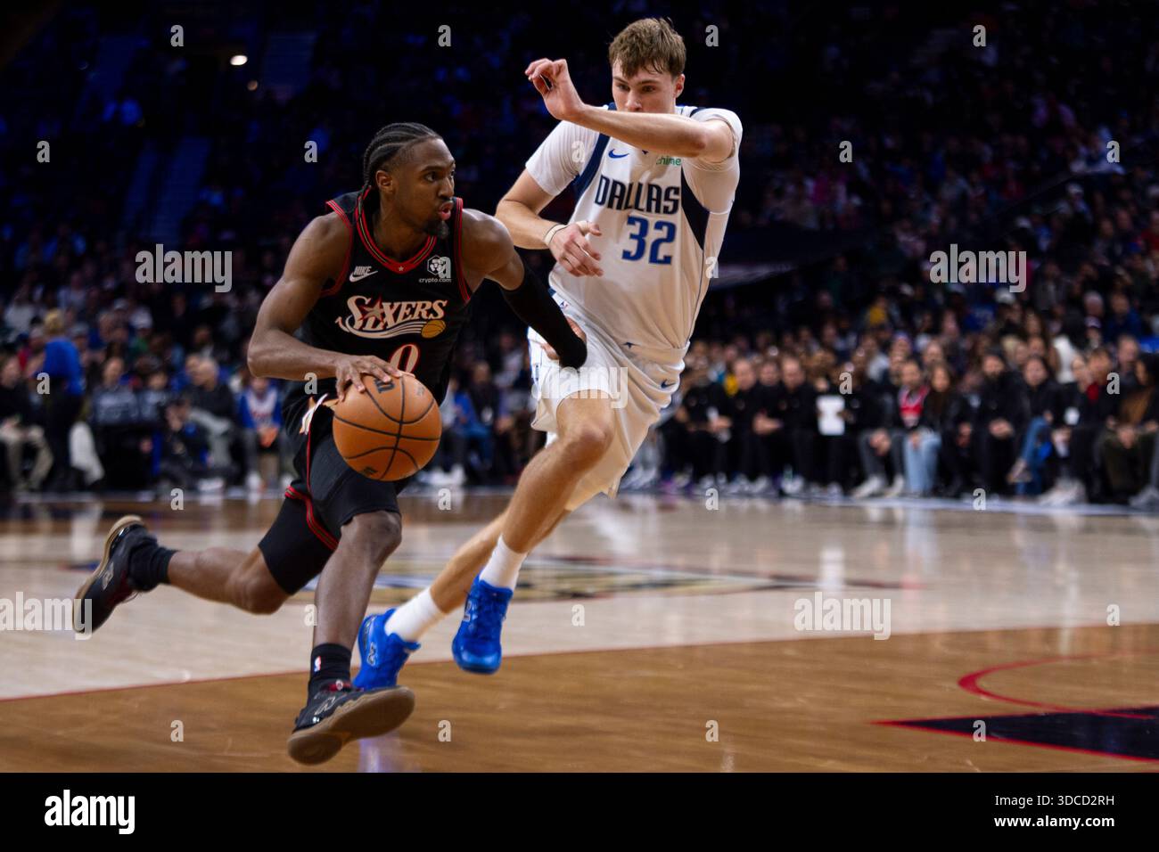 Philadelphia 76ers' Tyrese Maxey, left, drives to the basket against ...