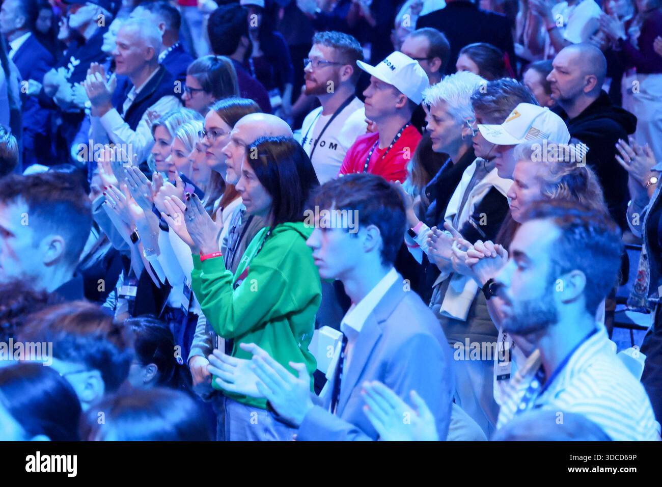 Attendees cheer while Border Czar Tom Homan speaks at Turning Point’s ...