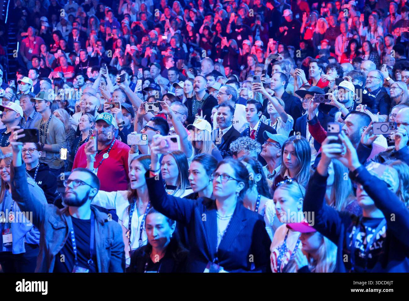 Attendees cheer while Border Czar Tom Homan speaks at Turning Point’s ...