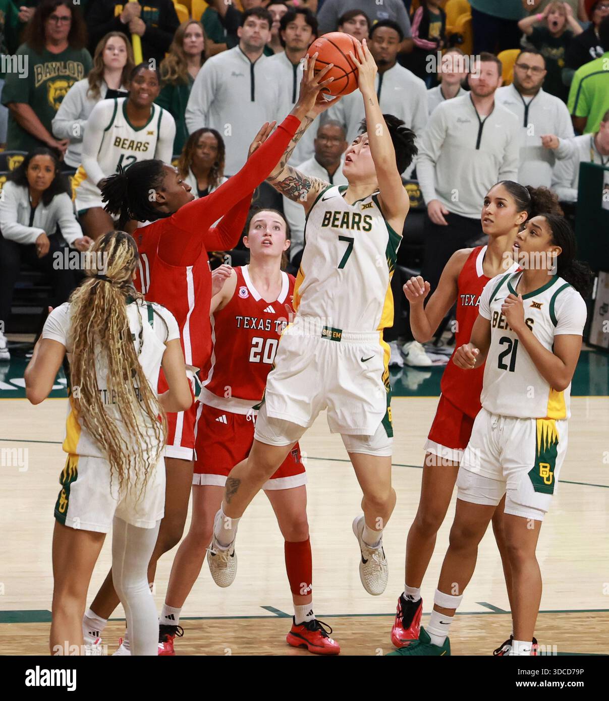 Texas Tech forward Sarengbe Sanogo, left, pressures Baylor guard Yuting ...