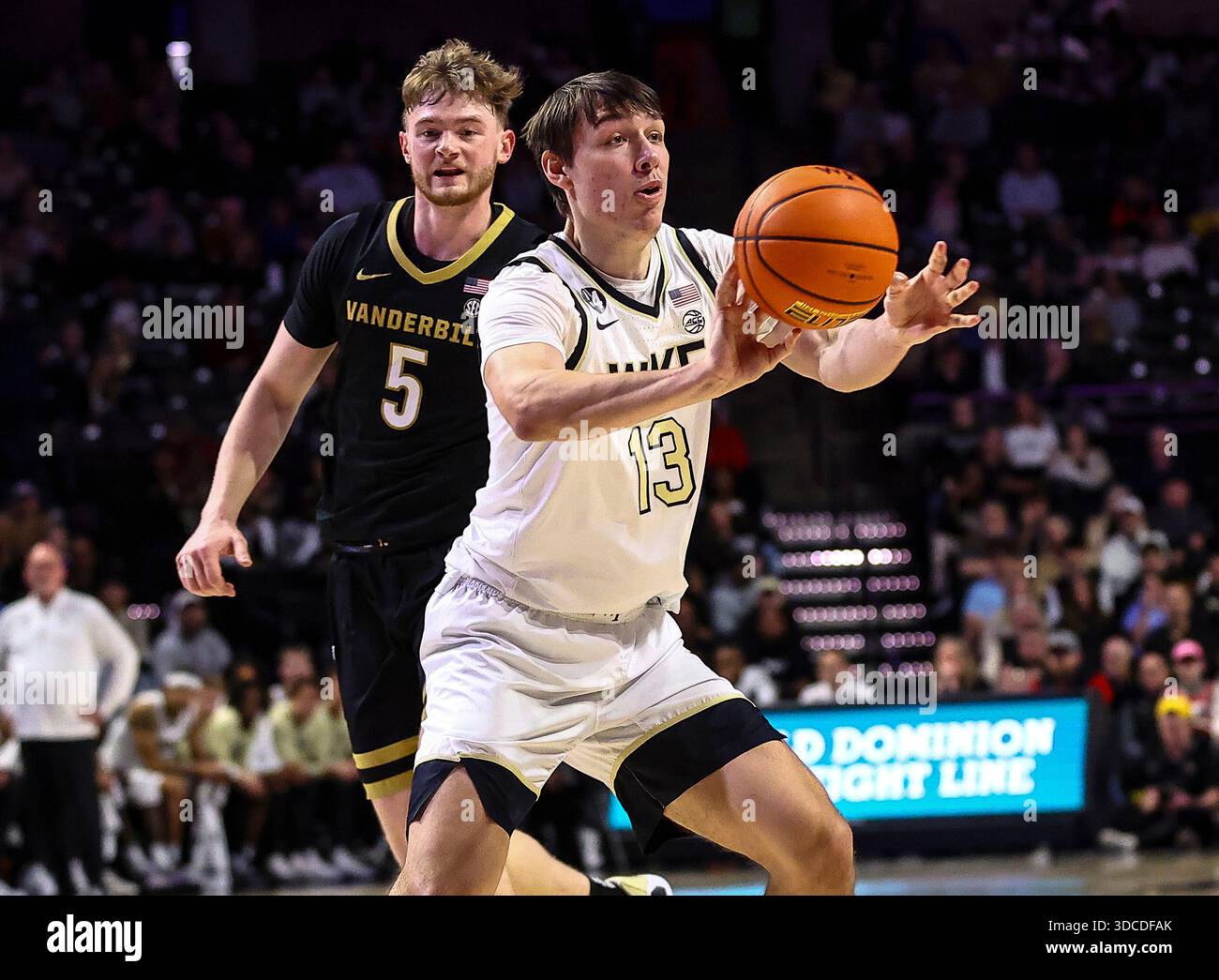 December 21, 2025: Wake Forest forward Cooper Schwieger (13) passes ...