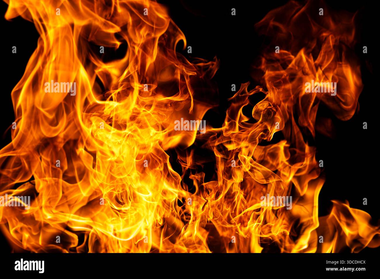 Flame pattern. Flames on black backdrop. Glowing flames on black ...