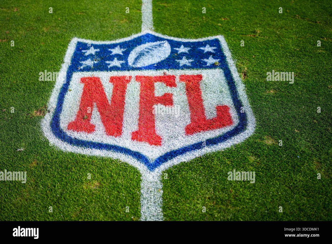 The NFL logo adorns the field during an NFL football game between the ...