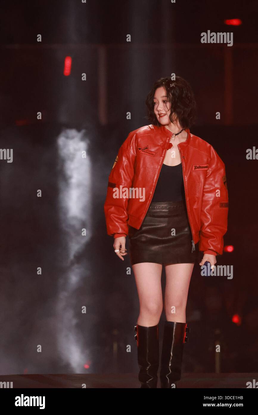 Chinese singer-songwriter Curley G attends an activity in Chengdu City ...