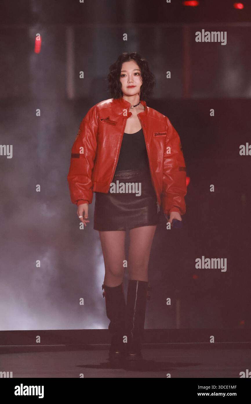 Chinese singer-songwriter Curley G attends an activity in Chengdu City ...