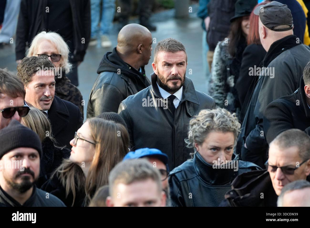 David Beckham arriving for the funeral service of former Stone Roses ...