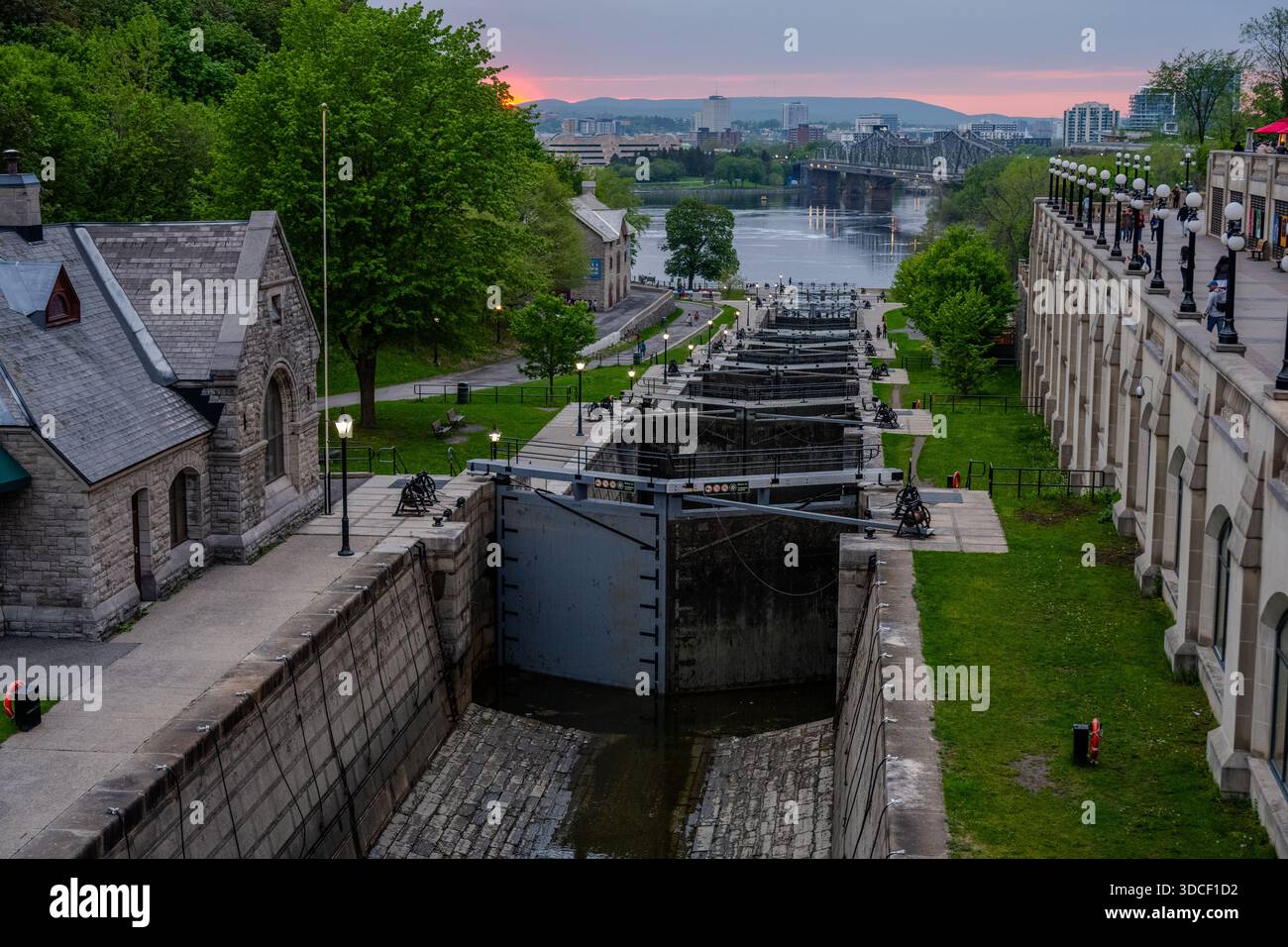 The historic Rideau Canal locks descend toward the Ottawa River with ...