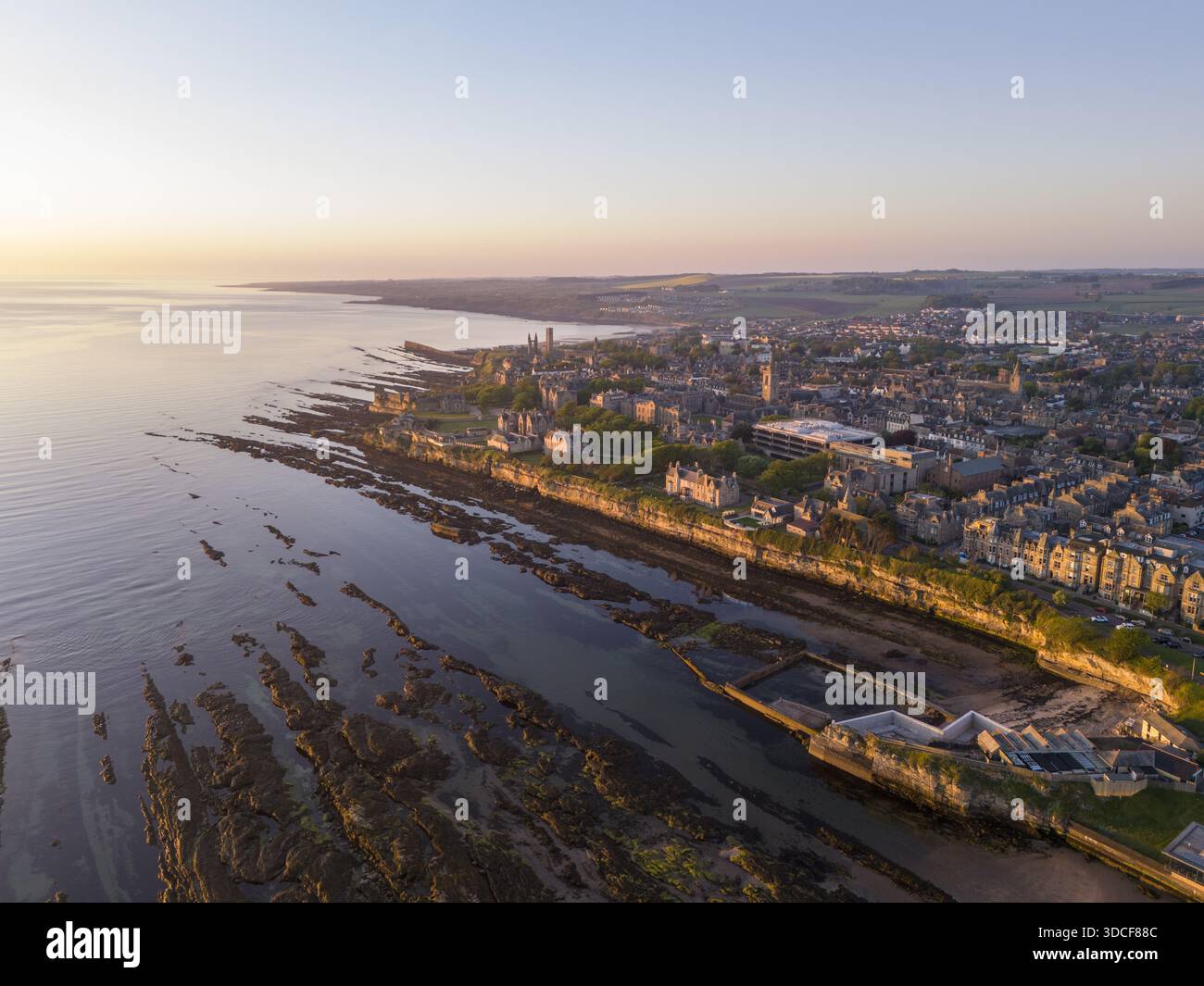 Aerial view of the rugged coastline meets the ancient town, where the ...