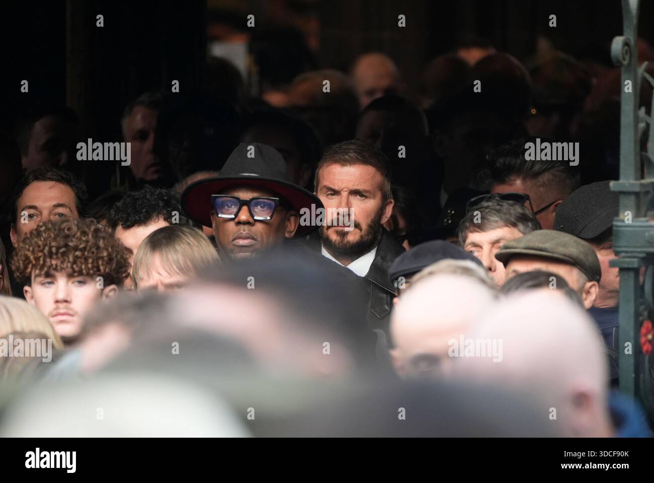 David Beckham departs the funeral service of former Stone Roses and ...