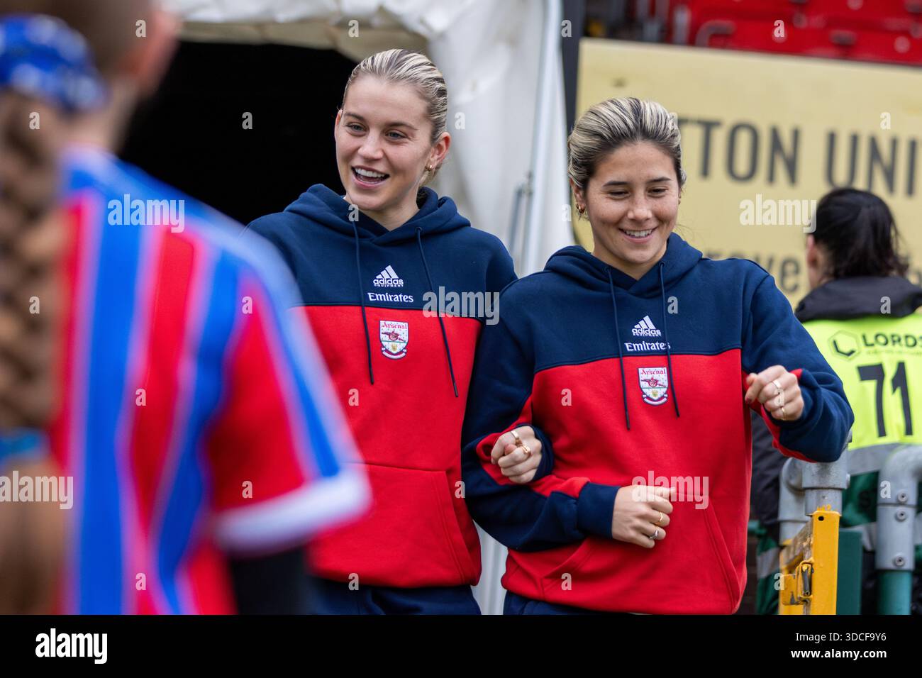 Sutton, UK. 21st Dec 2025. Alessia Russo and Kyra Cooney-Cross of ...