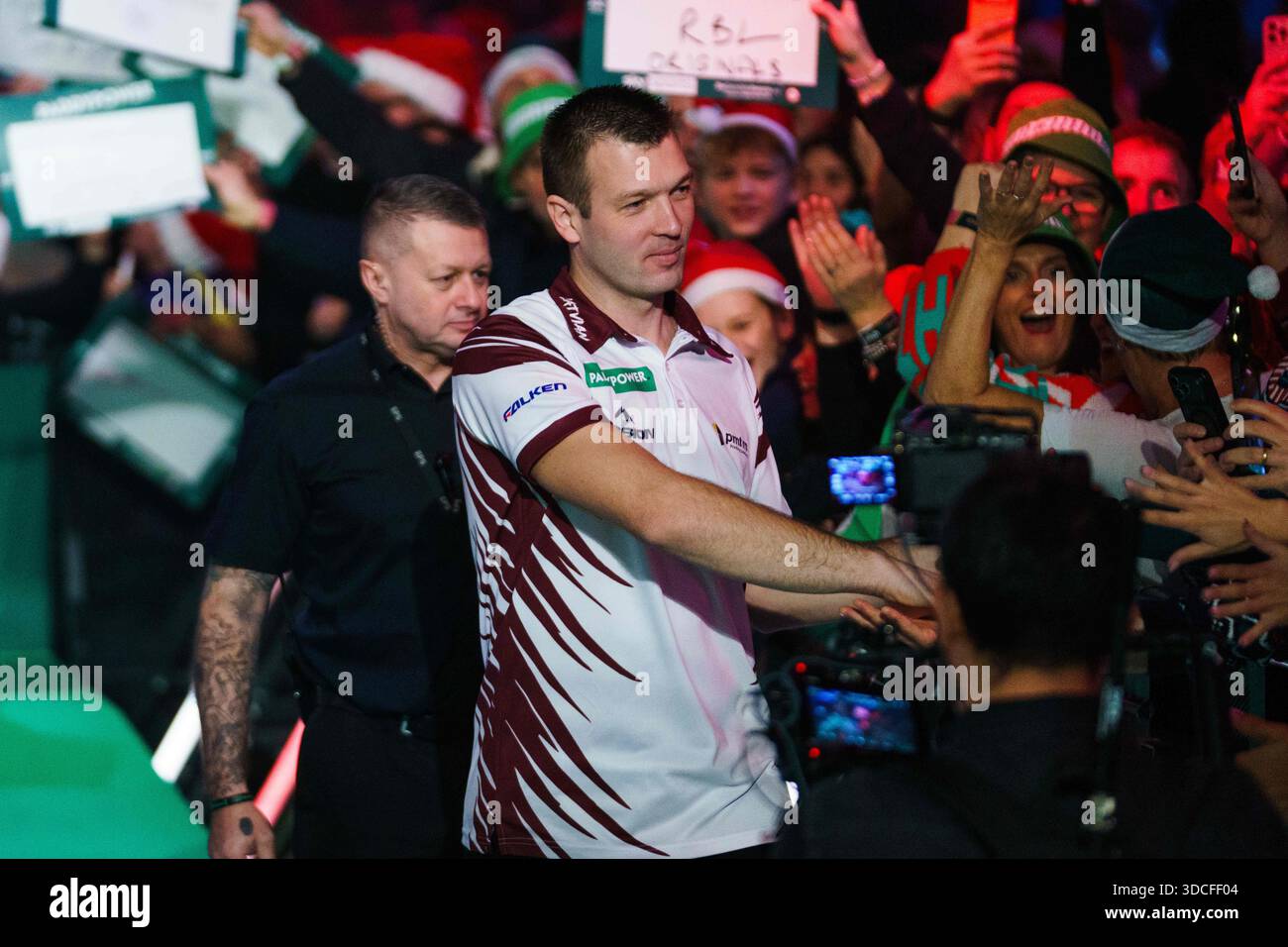 Madars Razma's walk on during the second round match between Darren ...