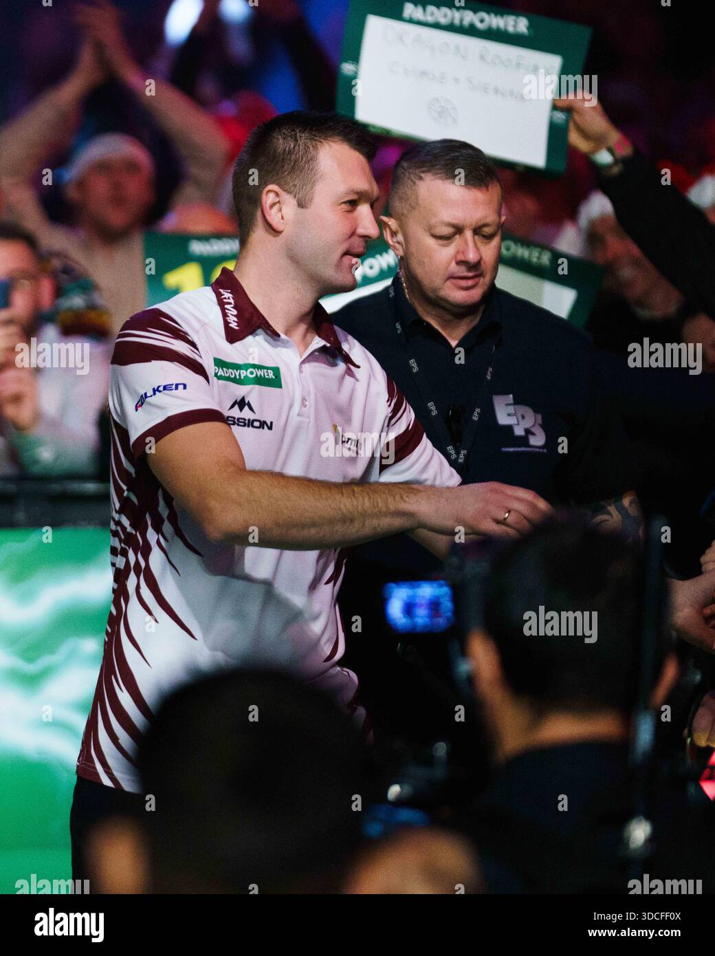 Madars Razma's walk on during the second round match between Darren ...