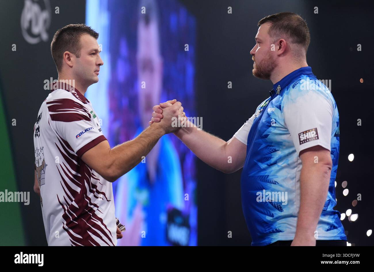 Winner Latvia's Madars Razma (left) shakes hands with Scotland's Darren ...
