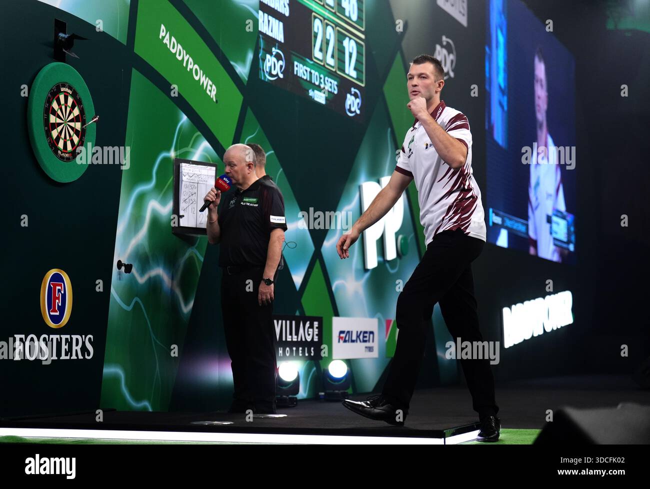 Latvia's Madars Razma celebrates defeating Scotland's Darren Beveridge ...