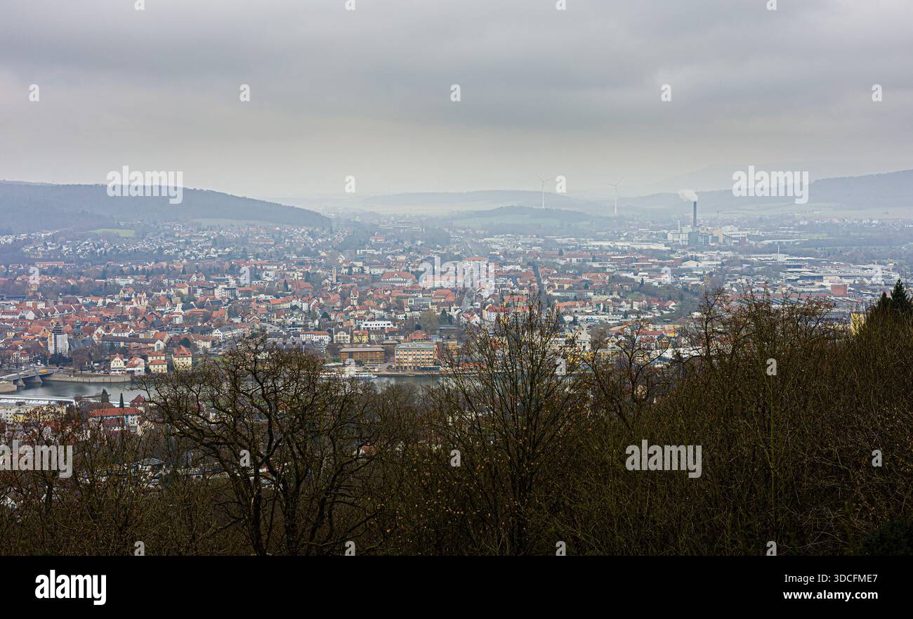 22 December 2025, Lower Saxony, Hameln: Dark clouds hang over the city ...