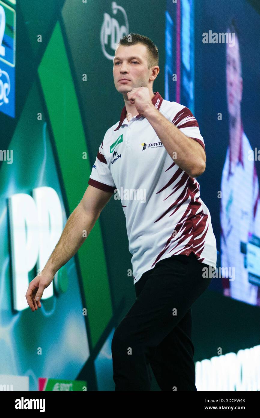 Madars Razma celebrating winning the second round match between Darren ...