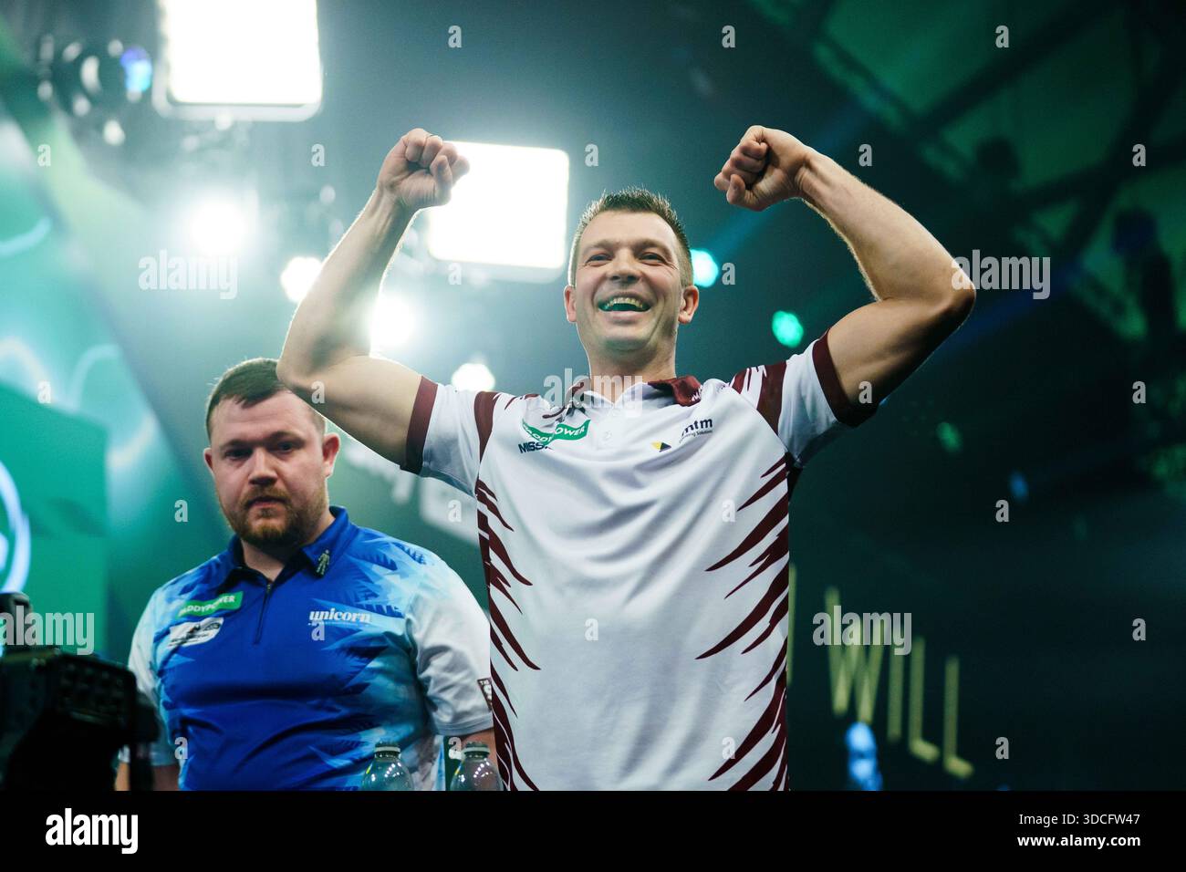 Madars Razma celebrating winning the second round match between Darren ...