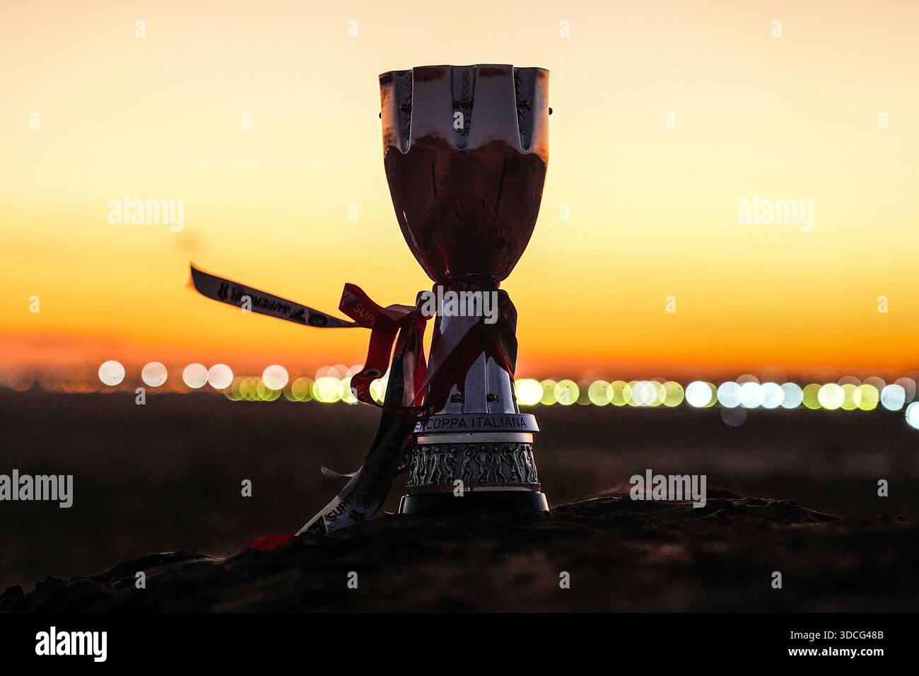 The Italian Super Cup standing in desert landscape at sunset , Saudi ...