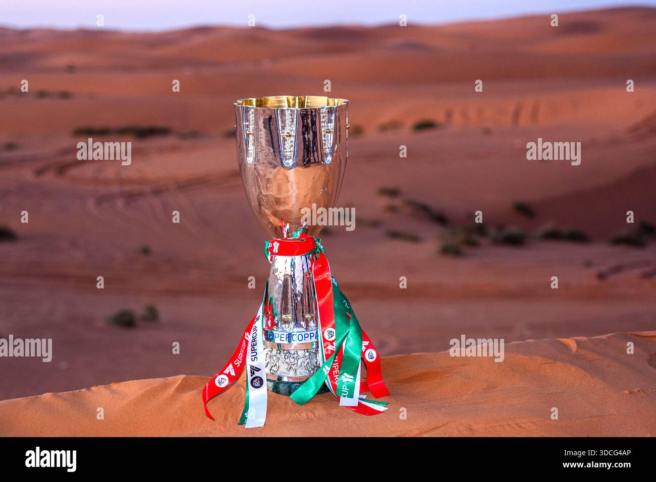 The Italian Super Cup standing in desert landscape at sunset , Saudi ...