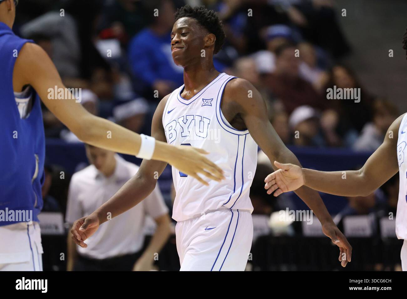 BYU forward AJ Dybantsa celebrates with teammates during a timeout ...