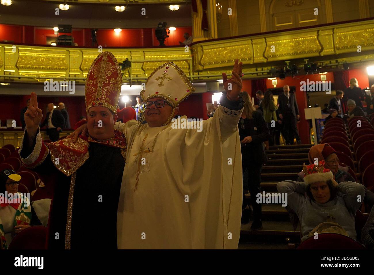 Several people in costume wait for the start of the Sorteo ...