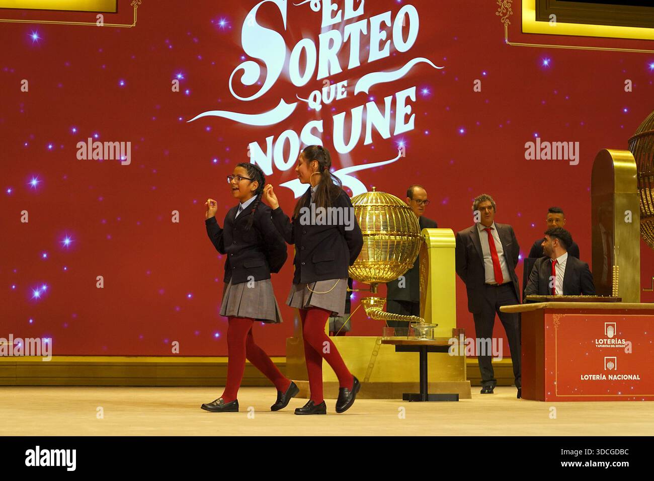 Two girls from the San Ildefonso School, sing a Christmas Lottery prize ...