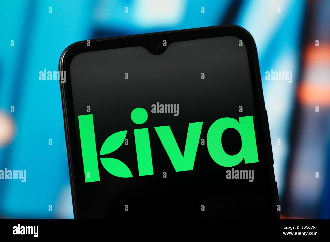 In this photo illustration, the Kiva logo is seen displayed on a ...