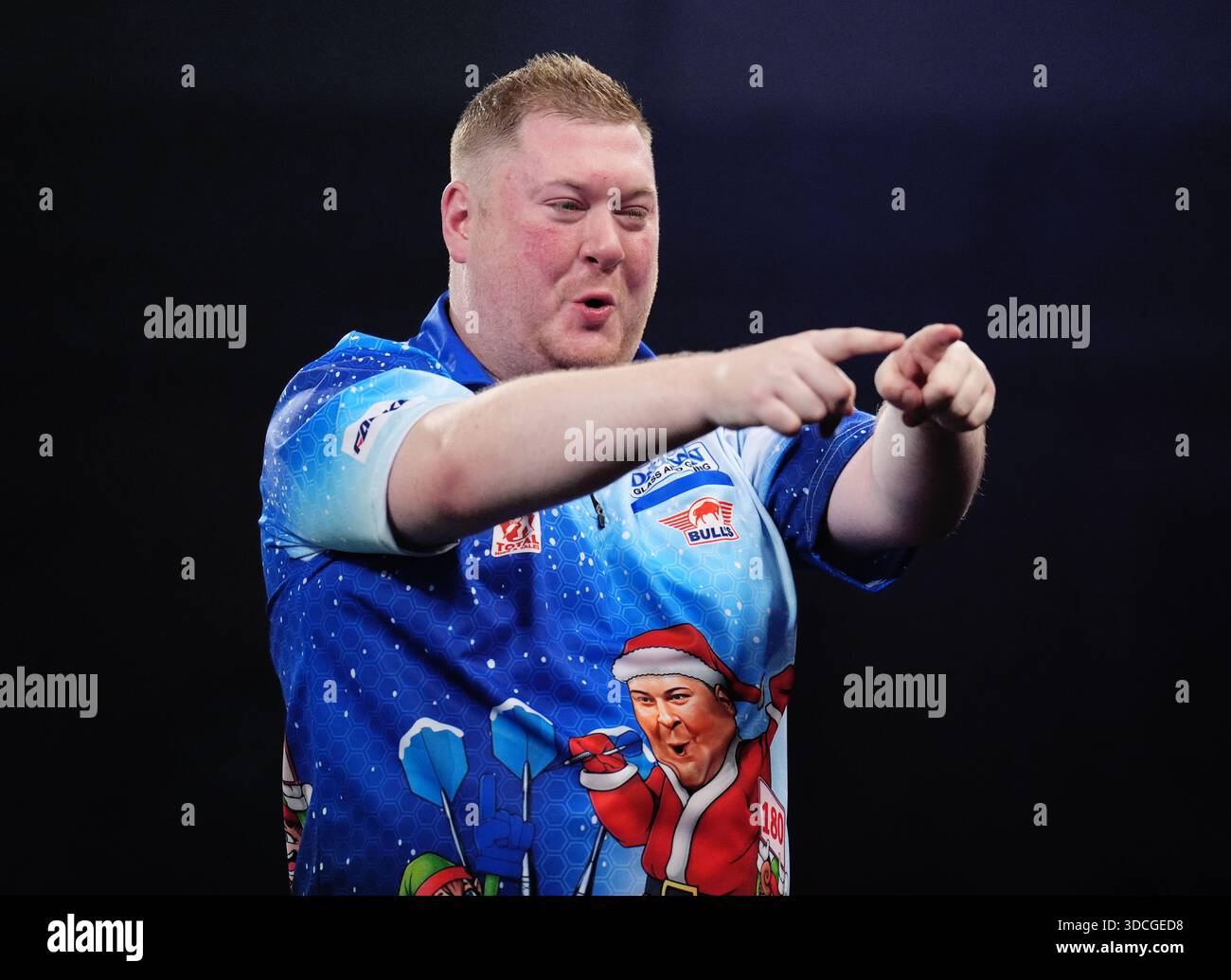 England's Ricky Evans celebrates defeating England's James Wade on day ...