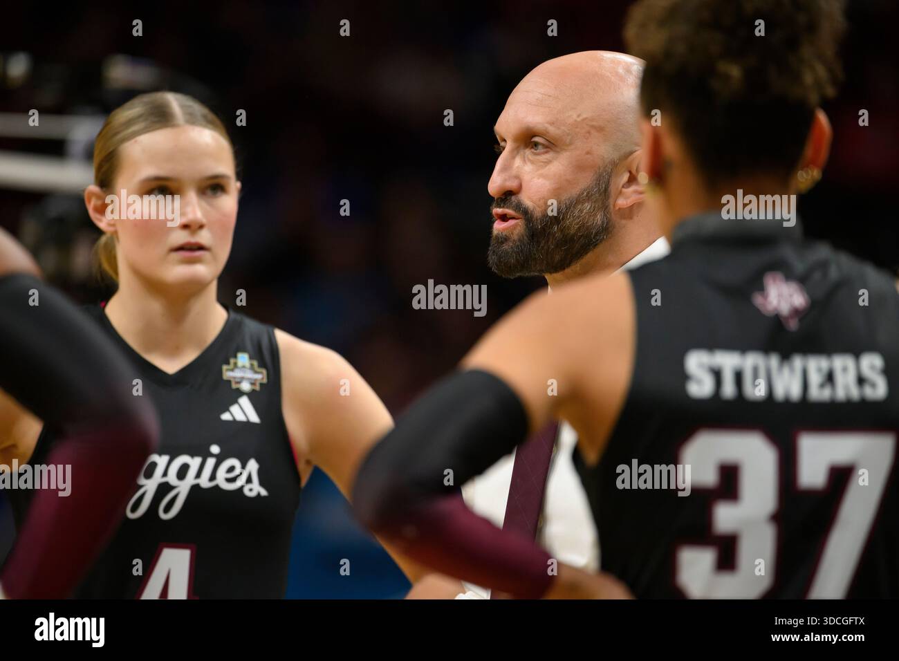 Texas A&M head coach Jamie Morrison talks to his players during the ...