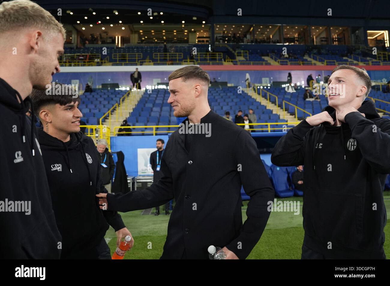 Napoli's Sam Beukema greets Bologna players during the EA Sports FC ...