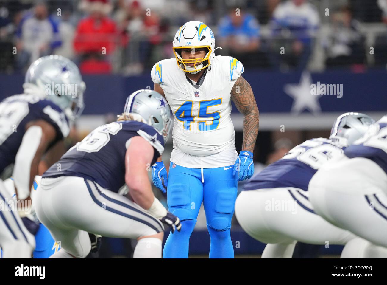 Los Angeles Chargers linebacker Tuli Tuipulotu (45) lines up for a play ...