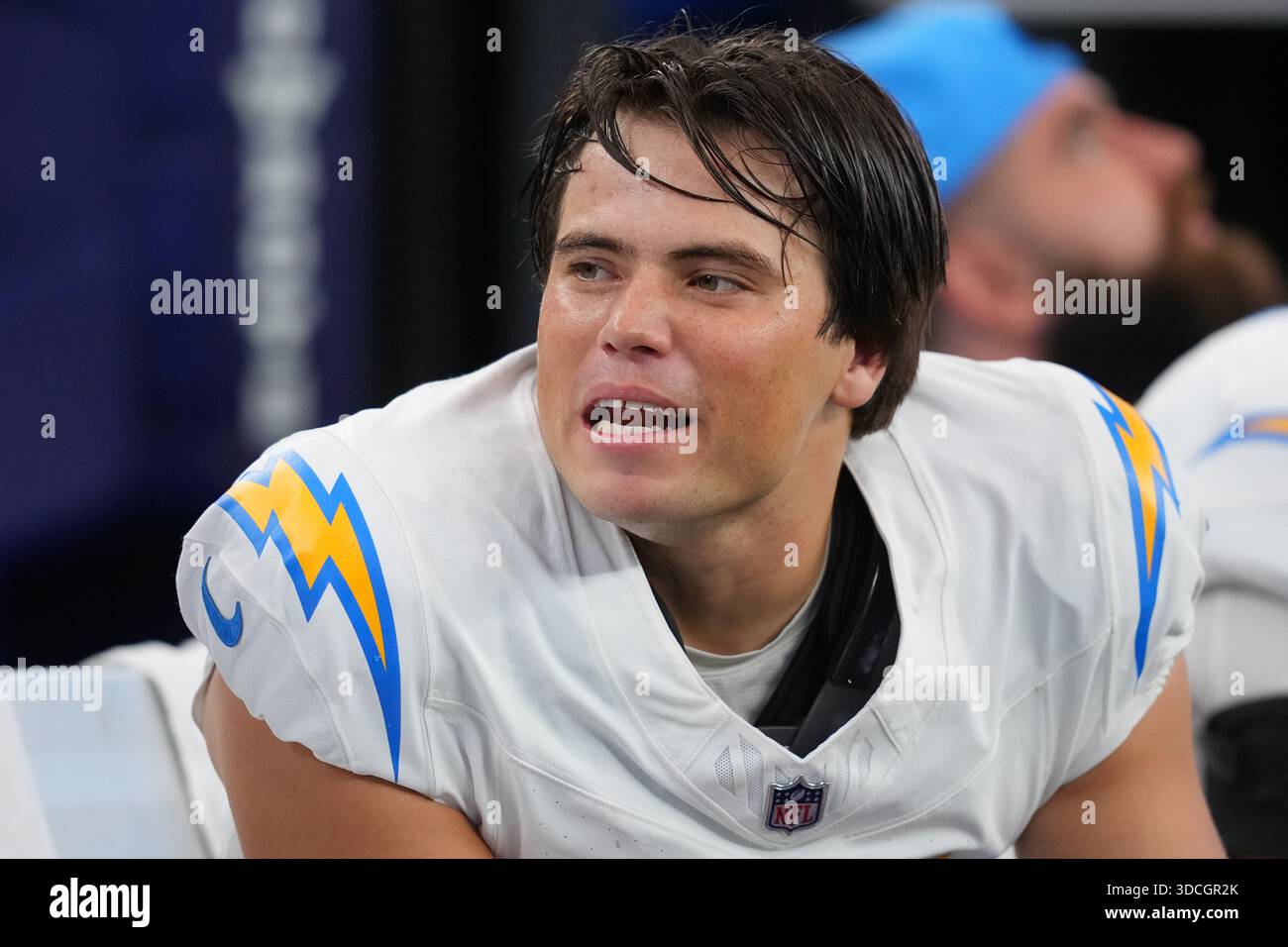 Los Angeles Chargers place kicker Cameron Dicker (11) looks on from the ...