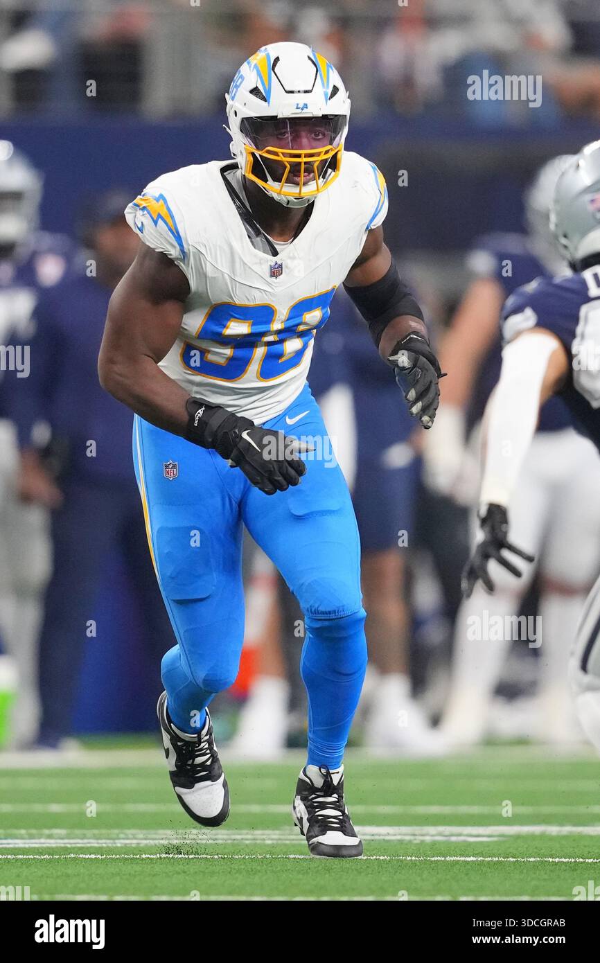 Los Angeles Chargers linebacker Odafe Oweh (98) rushes in during the ...