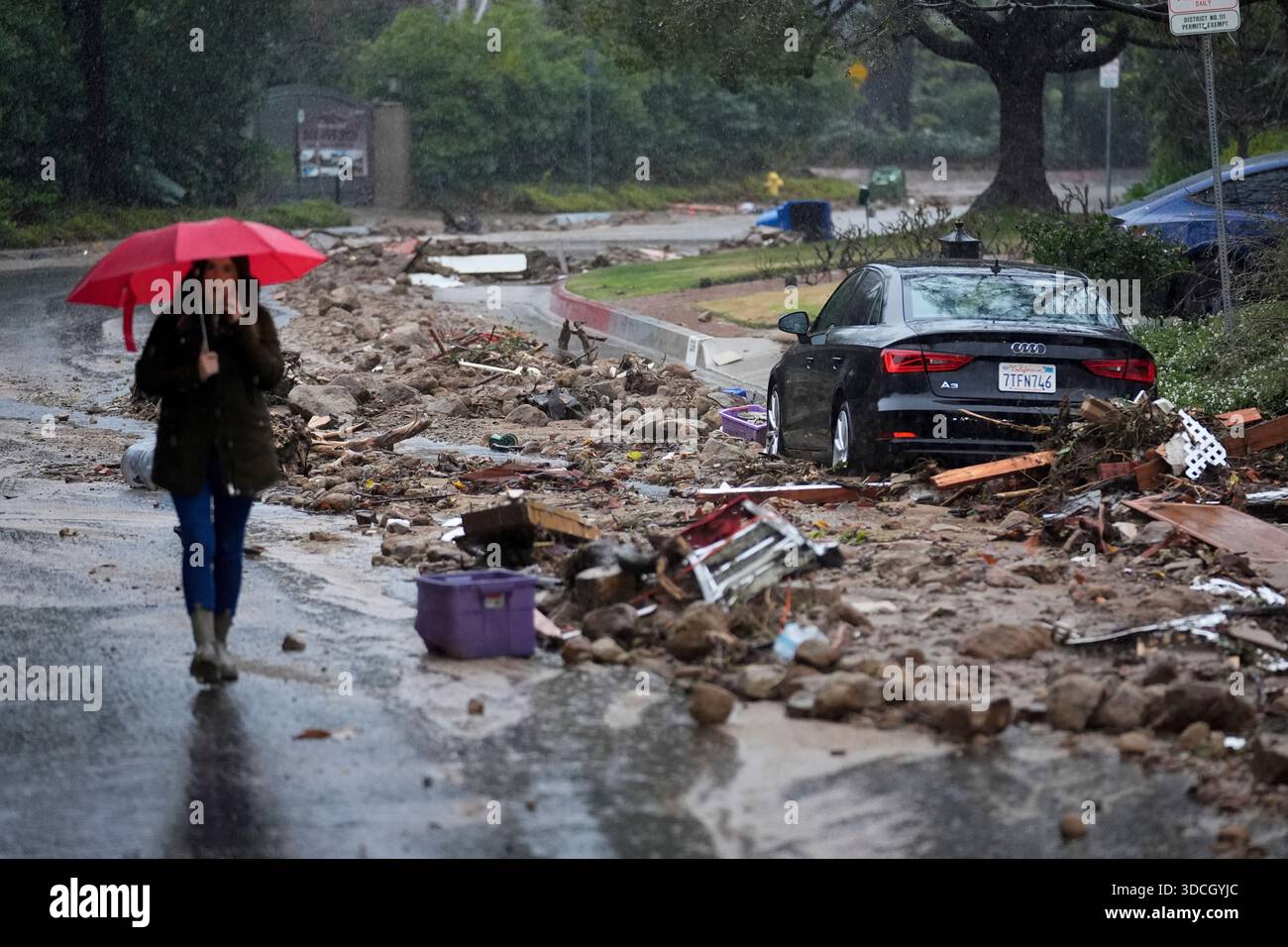 FILE - Mud and debris is strewn on Fryman Road during an atmospheric ...