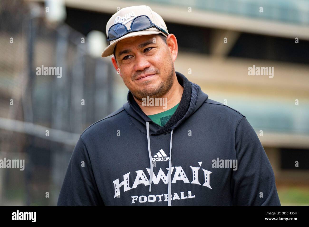 Hawaii head coach Timmy Chang smiles during an interview, Tuesday, Dec ...