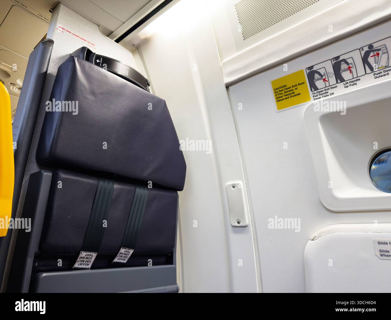 Manchester, UK - December 13, 2025: Compact airplane seating and safety ...