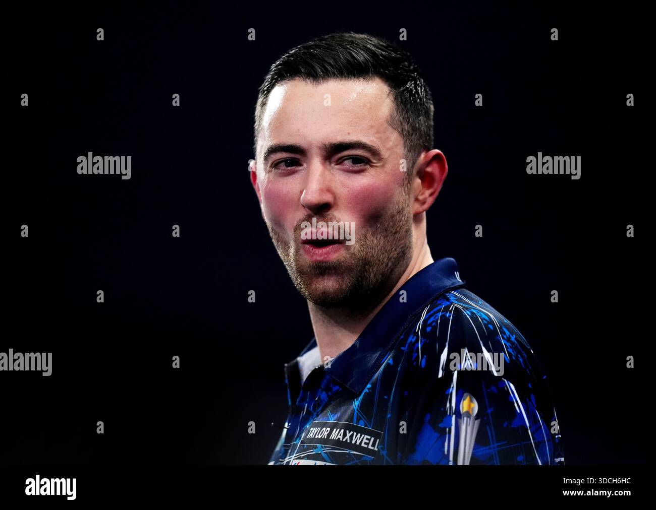 England's Luke Humphries during his match against Singapore's Paul Lim ...