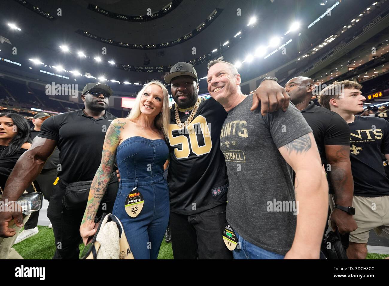 Rapper 50 Cent poses with fans before an NFL football game between the ...