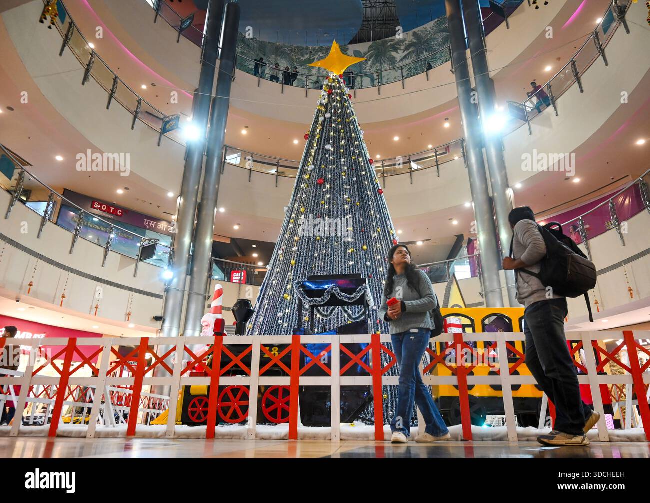 MUMBAI, INDIA - DECEMBER 22: 40 foot Christmas tree and toy train ...