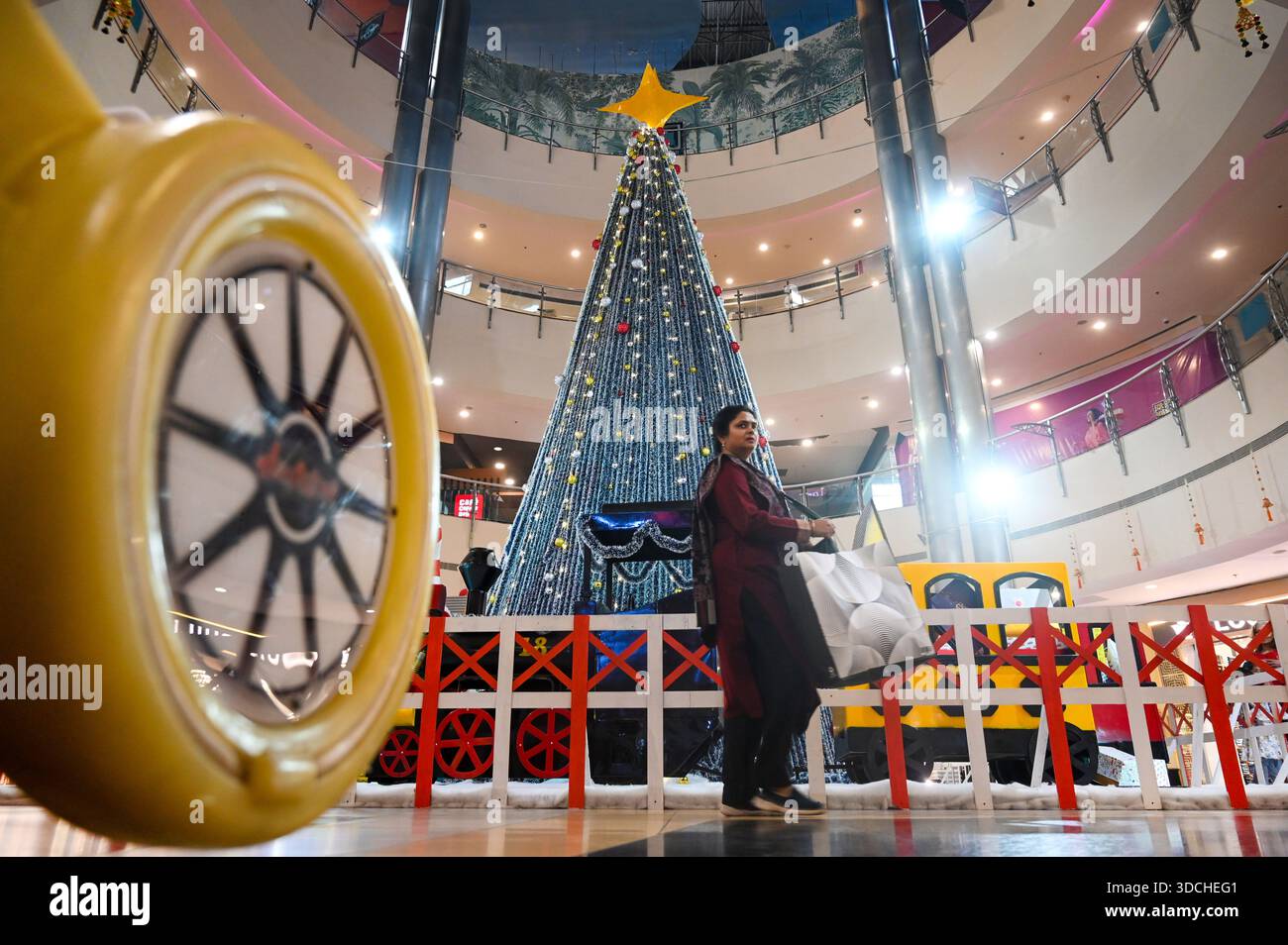 MUMBAI, INDIA - DECEMBER 22: 40 foot Christmas tree and toy train ...