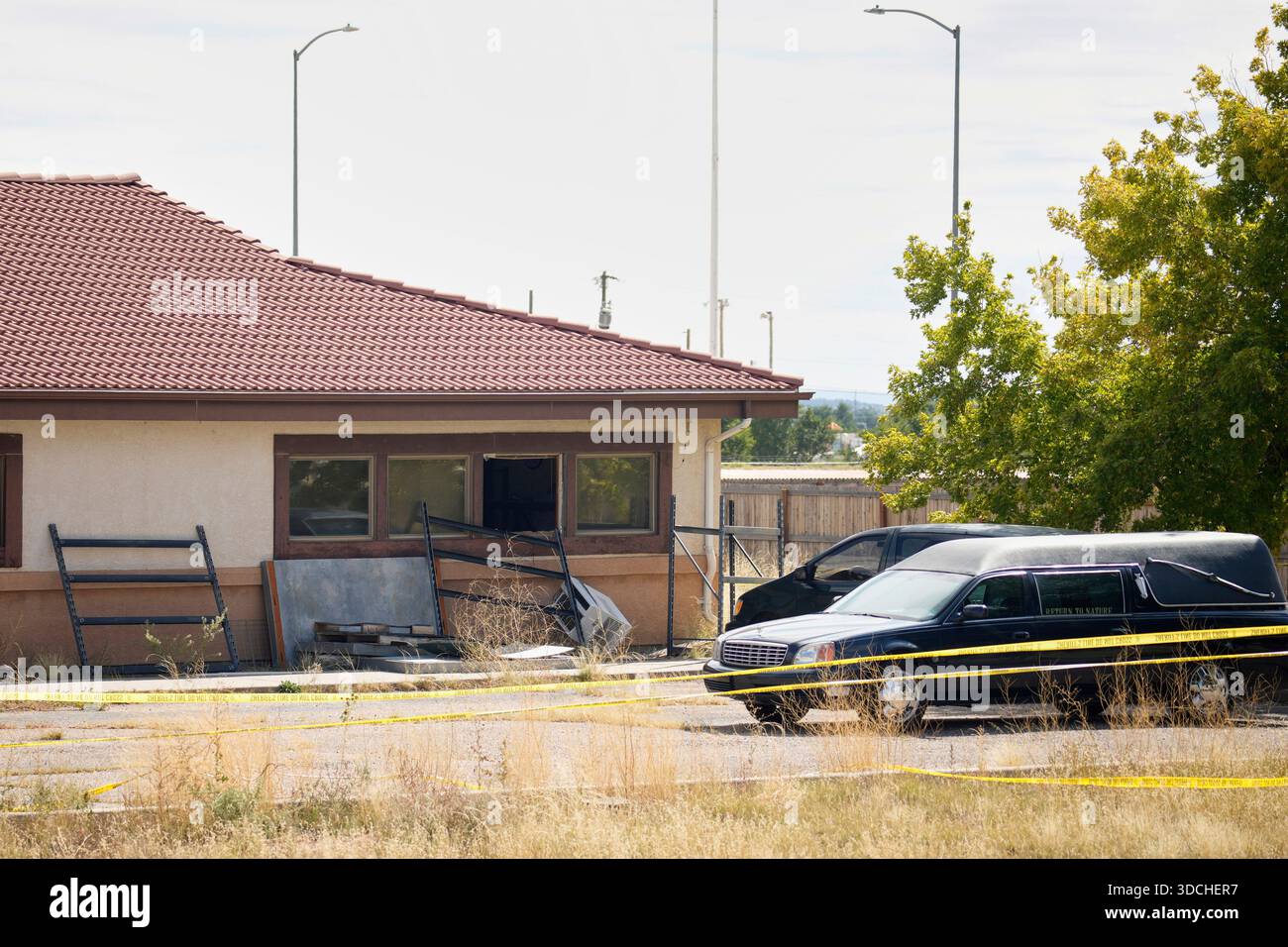 FILE - A hearse and van sit outside the Return to Nature Funeral Home ...