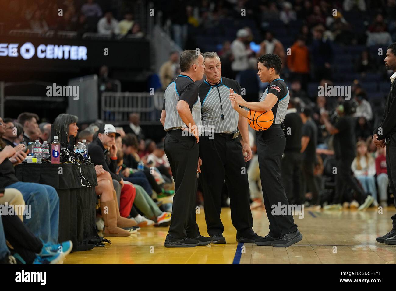 The referees, Chuck Gonzalez, Benda Pantoja and Kyle Bacon discuss a ...