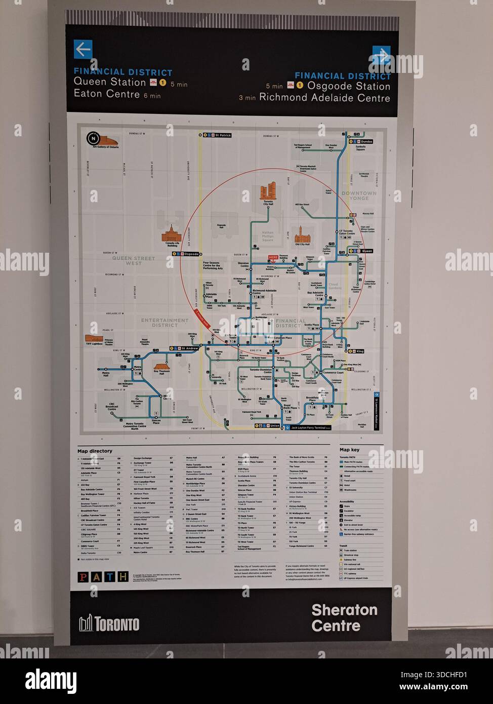 Financial district Queen Station information map sign at Eaton Centre ...