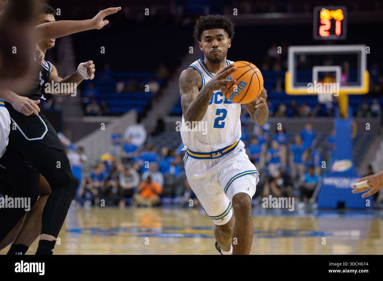 LOS ANGELES, CA - DECEMBER 19: UCLA Bruins guard Donovan Dent #2 drives ...